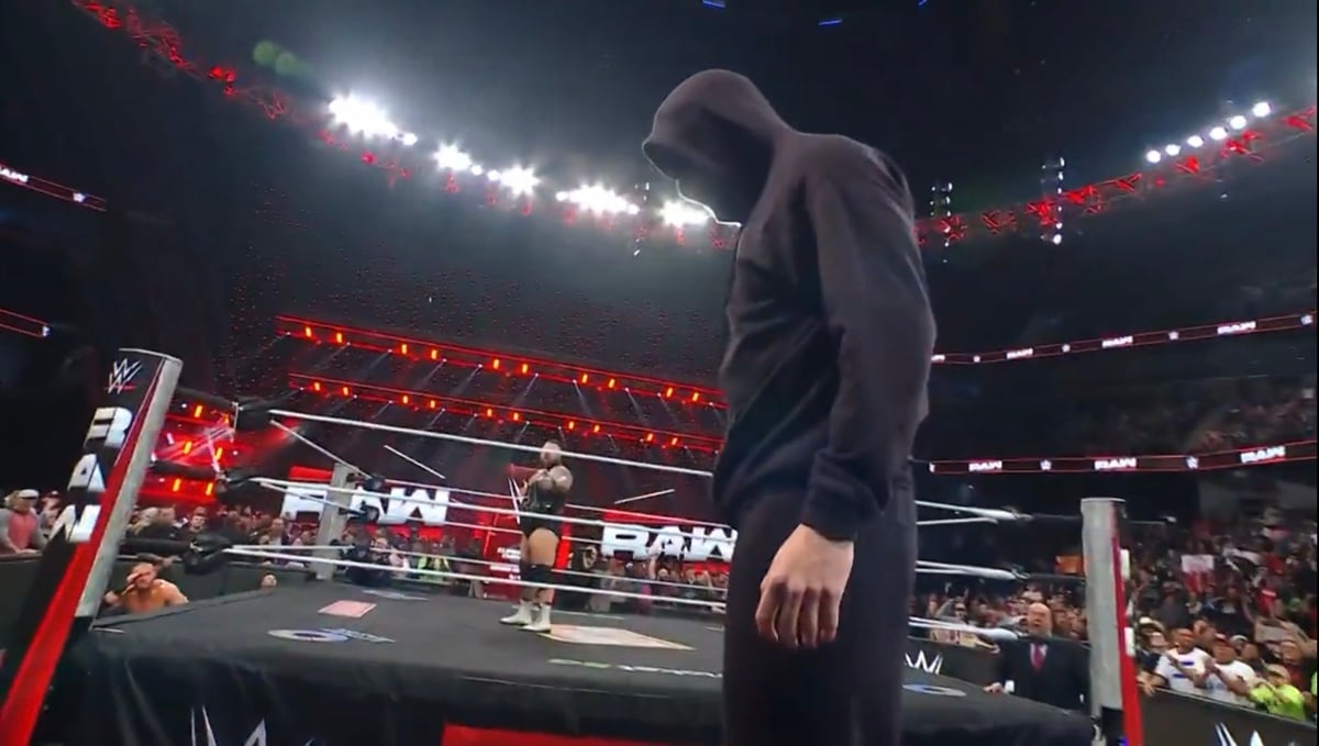 Masked Man Attacks Logan Paul on WWE RAW | SEScoops